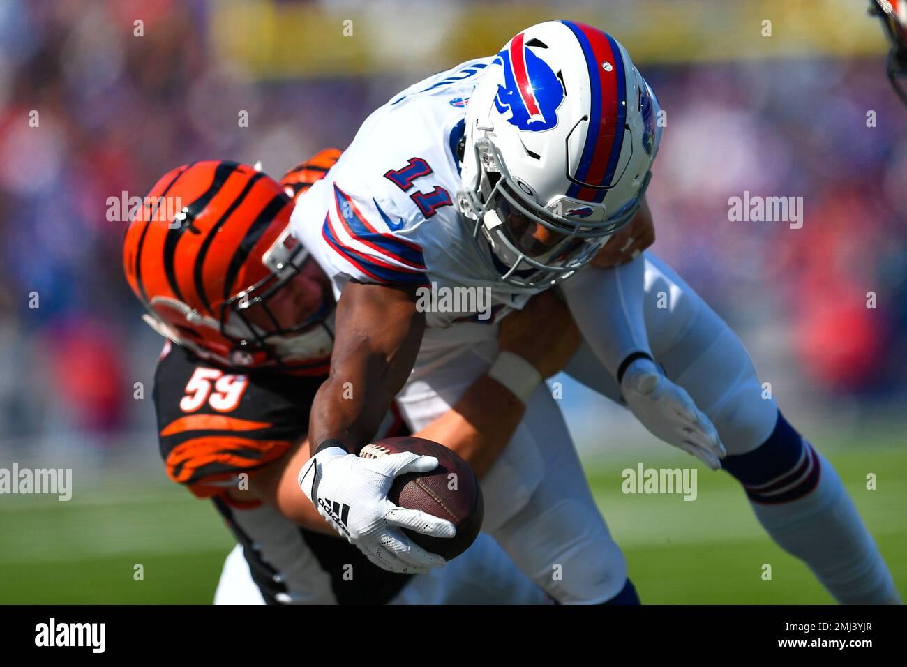 Cincinnati Bengals' Nick Vigil (59) tackles Buffalo Bills' Zay Jones ...
