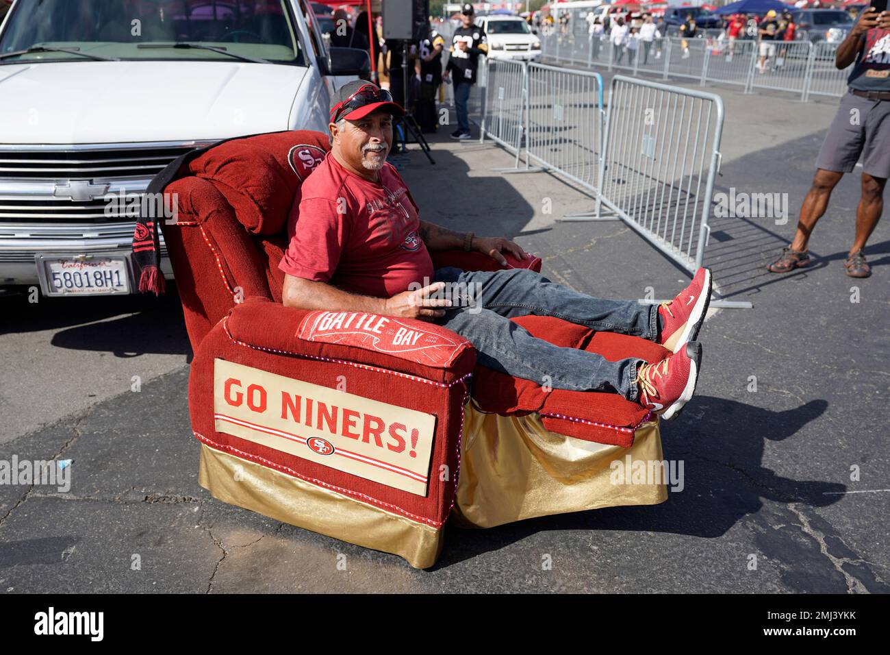 Albert Vann rides a motorized chair as fans tailgate at Levi's Stadium ...