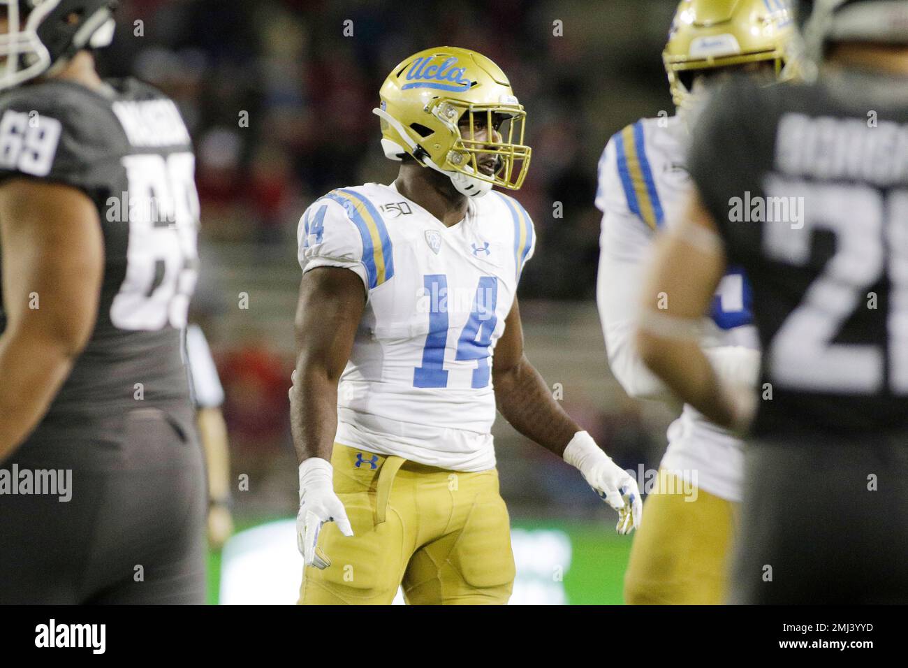UCLA linebacker Krys Barnes (14) stands on the field during the second ...