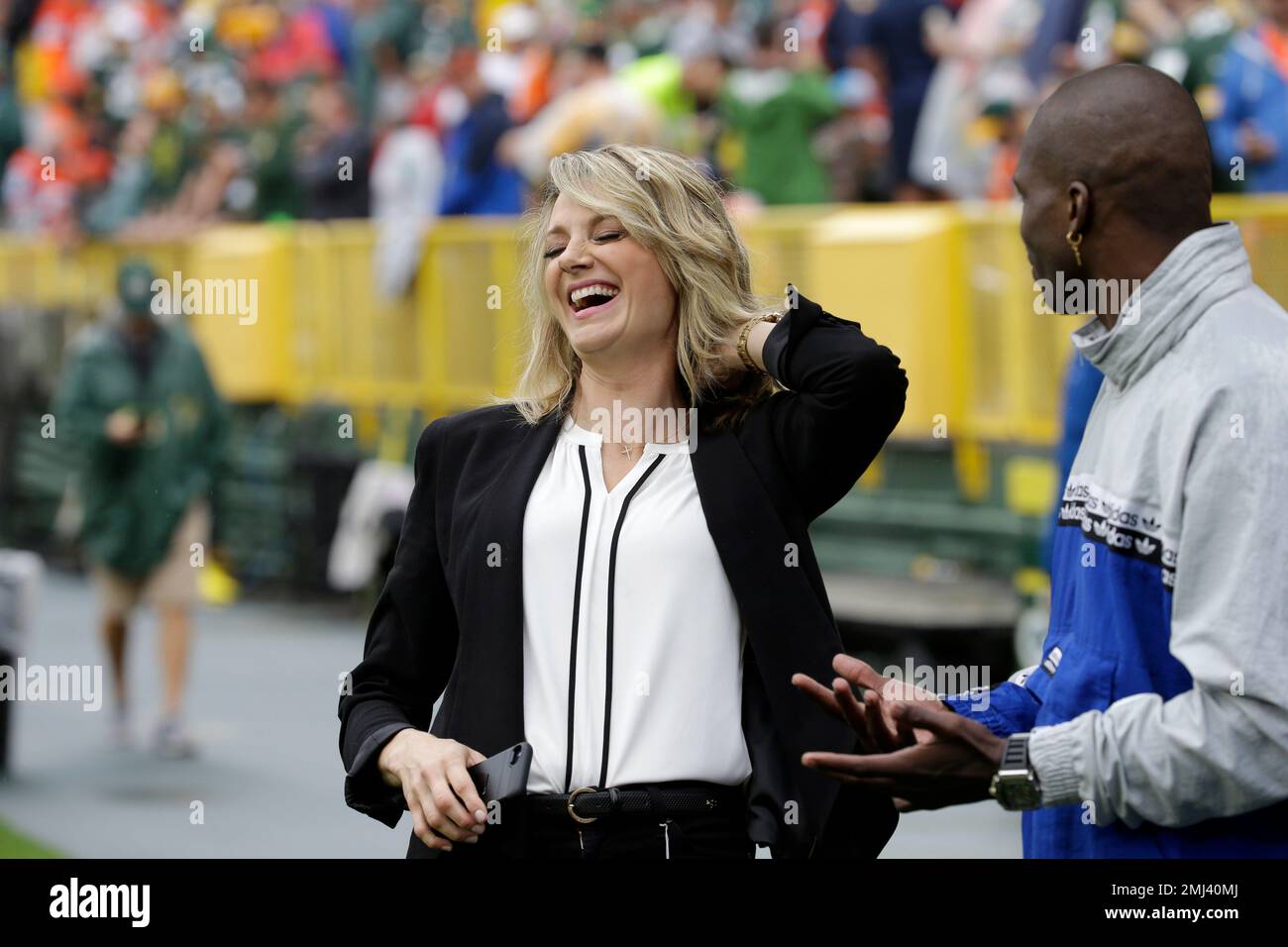 NFL Network sideline reporter Stacey Dales, left, talks with former ...