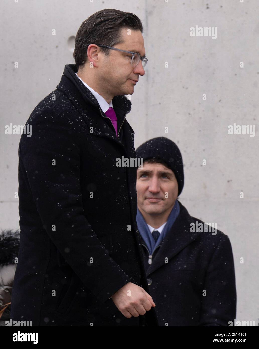 Prime Minister Justin Trudeau watches Conservative leader Pierre ...