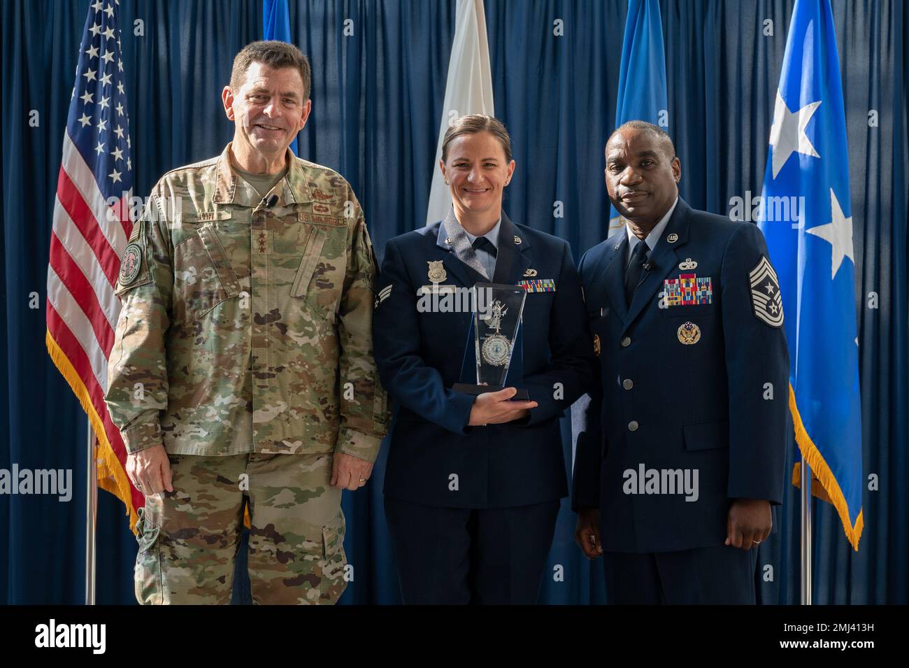 U.S. Air Force Senior Airman Kristina L. Schneider, center, of the ...