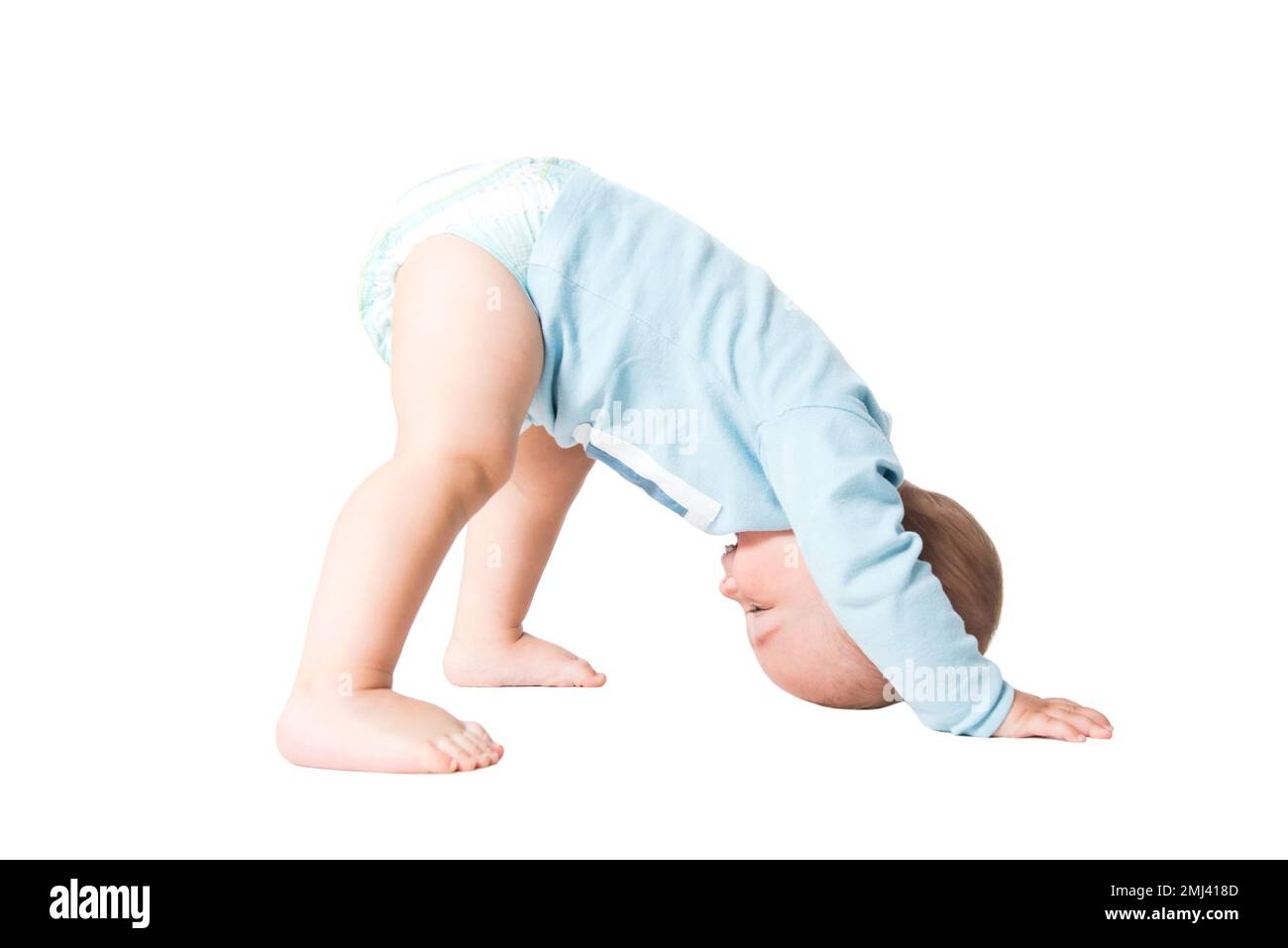 Happy one year kid plying and having fun, isolated over white ...