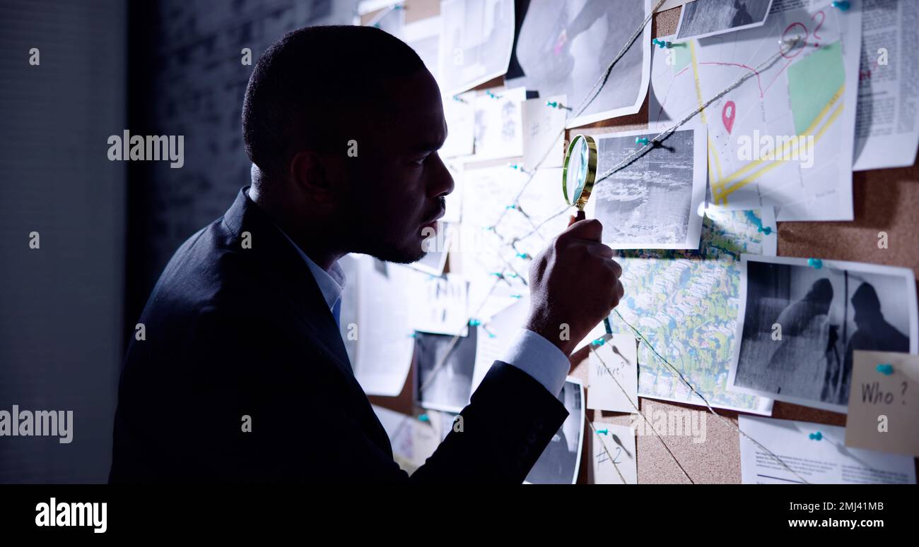 Police Inspection Looking For Clues On Investigation Board Stock Photo ...