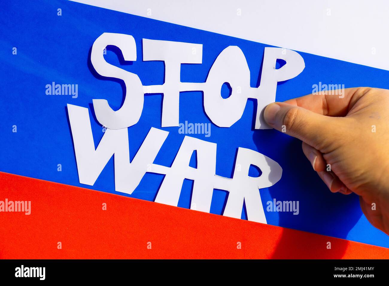 Stop war, conflict between Ukraine and Russia. A man holding a hand ...