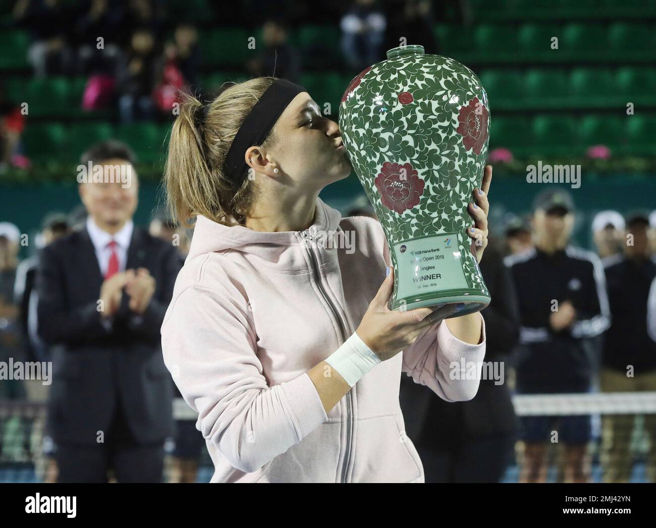 Karolina Muchova of the Czech Republic kisses her winning trophy after ...