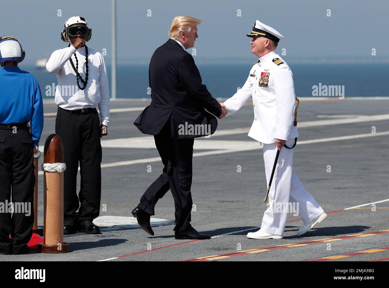 FILE - In this July 22, 2017, file photo, President Donald Trump shakes ...