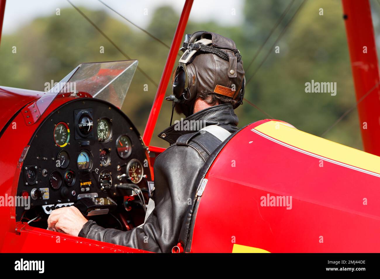 Pilot in his biplane Stock Photo - Alamy