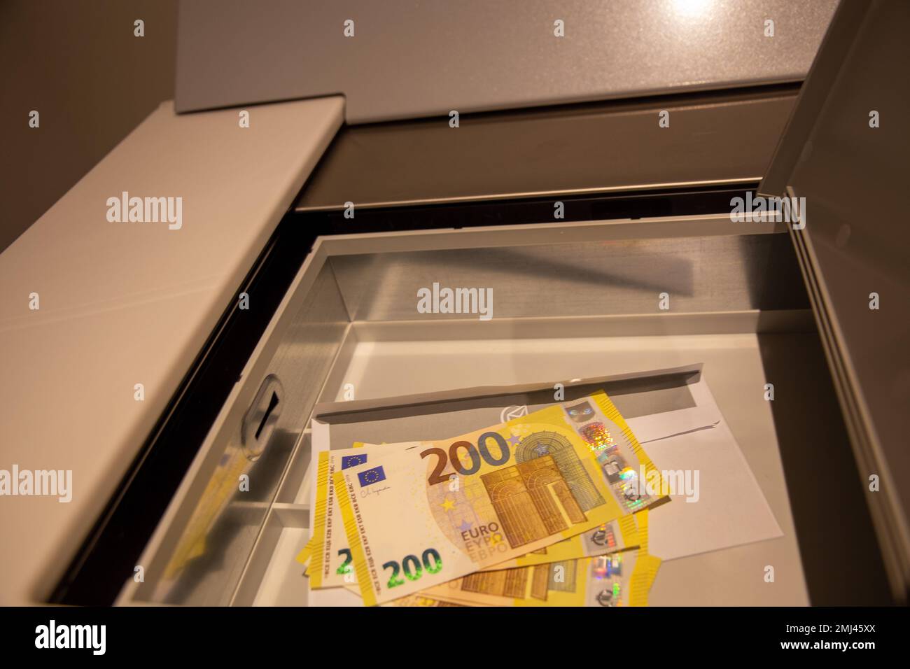 Euro banknotes in a safe deposit box Stock Photo - Alamy