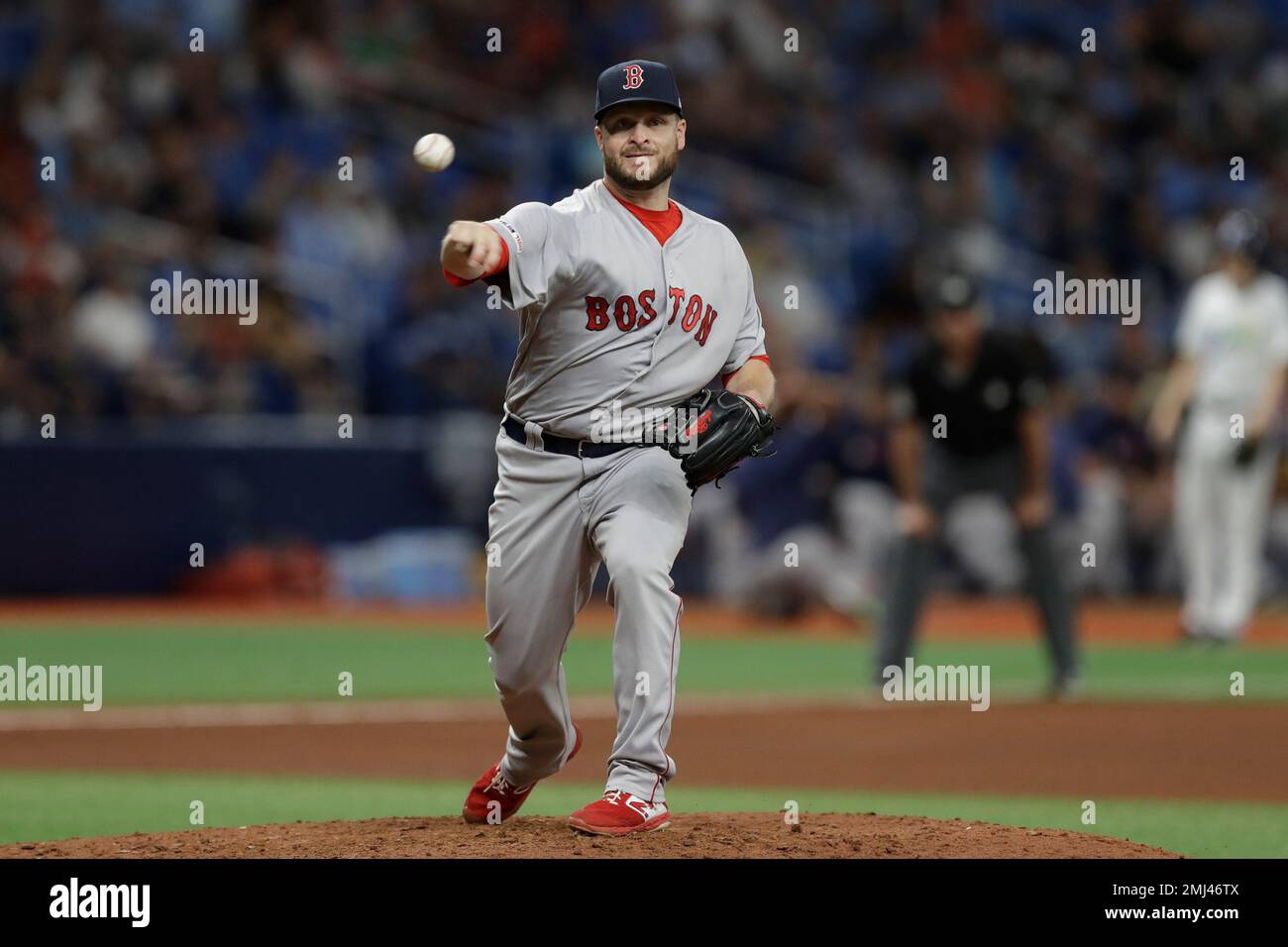 Boston Red Sox relief pitcher Ryan Brasier pickoff move to first base ...