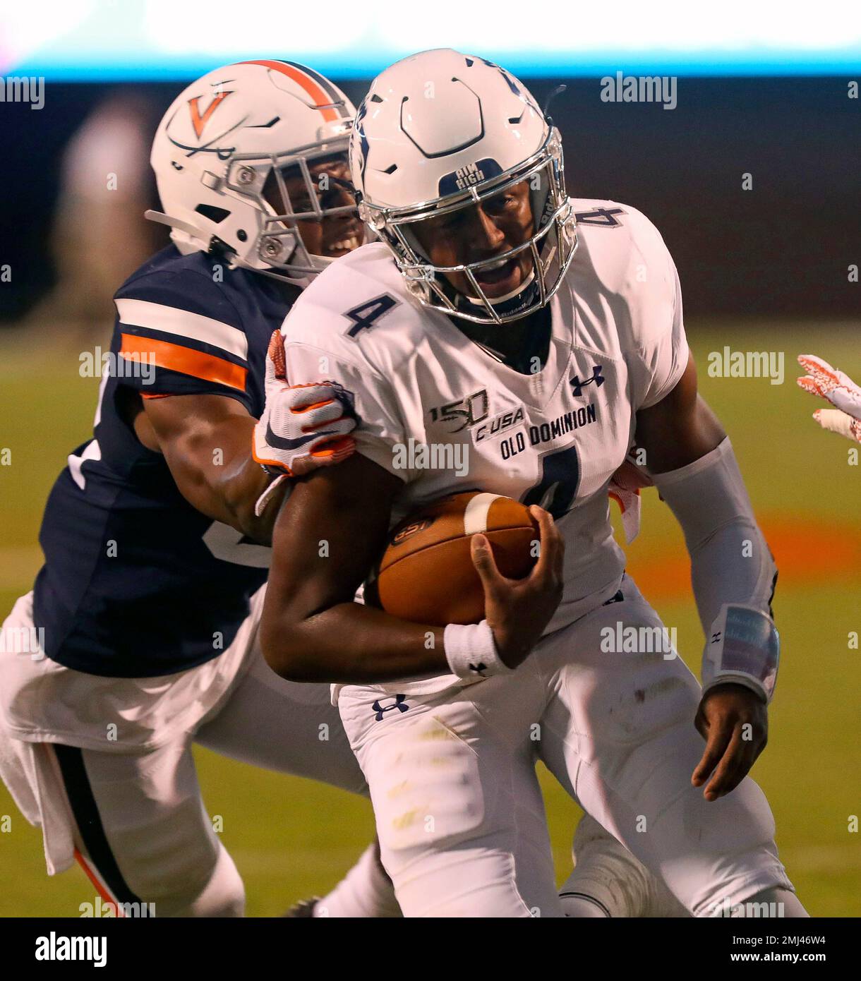 Old Dominion quarterback Stone Smartt (4) is tackled by Virginia ...