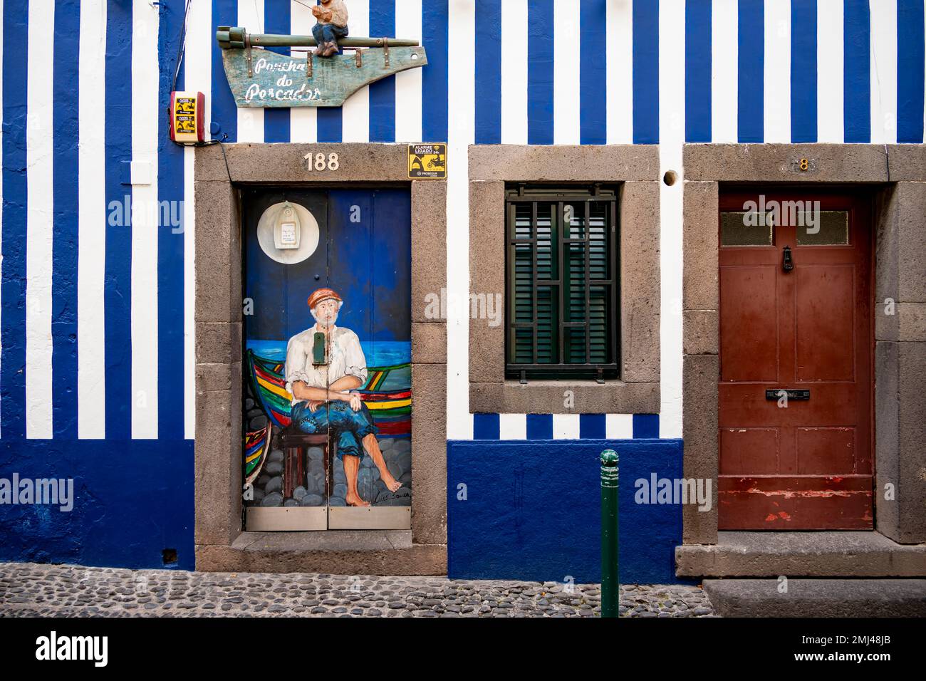 Mural, Colourful painted door, Funchal, Madeira, Portugal Stock Photo ...