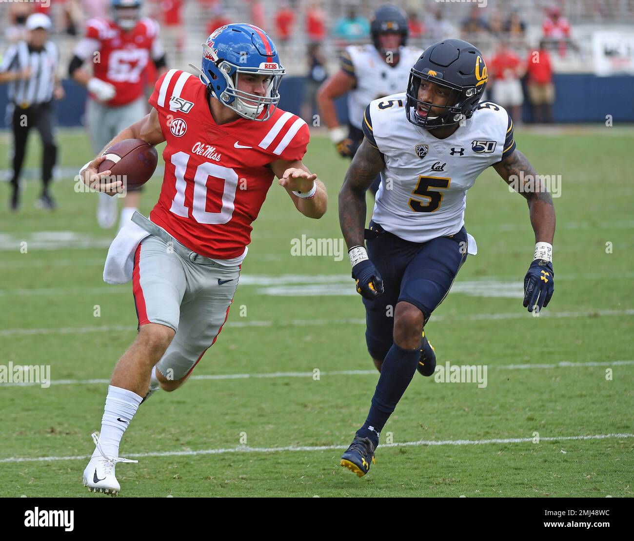 Mississippi quarterback John Rhys Plumlee (10) runs the ball as ...