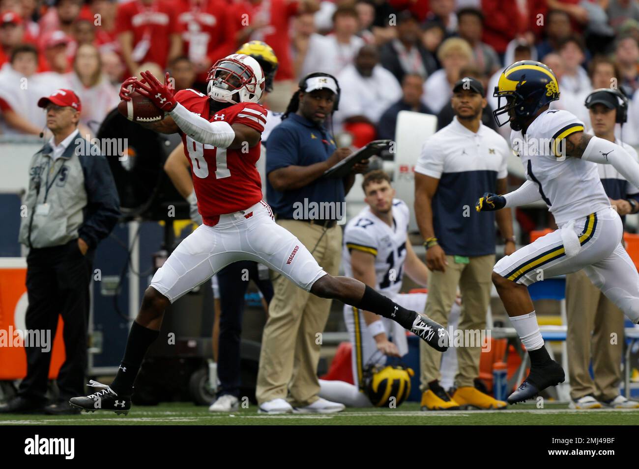 Wisconsin wide receiver Quintez Cephus, left, makes a first-down ...