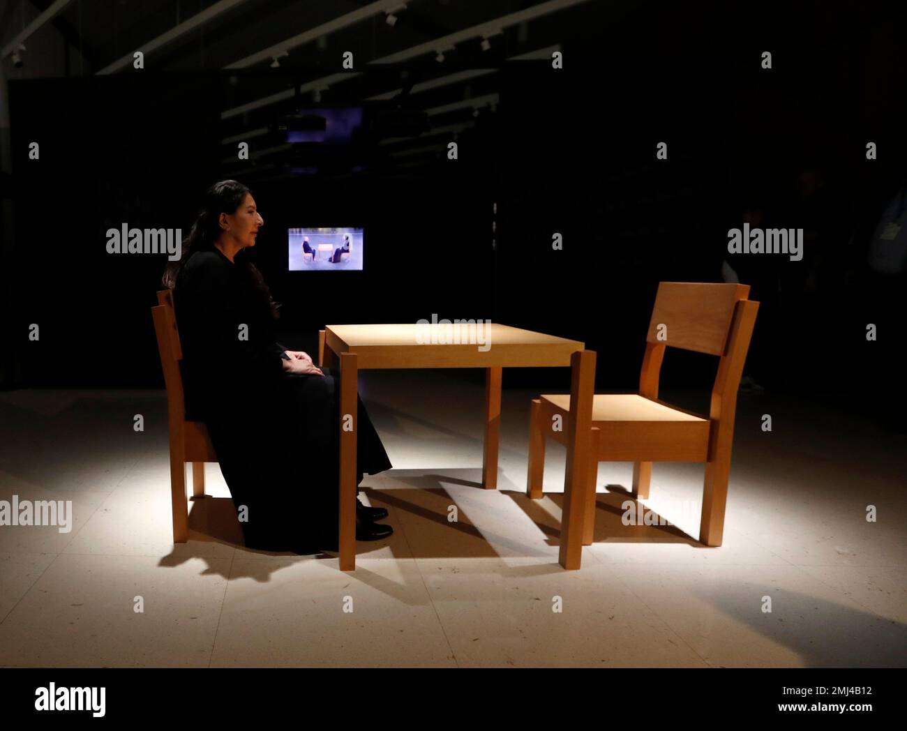 Performance artist Marina Abramovic performs during the art exhibition ...