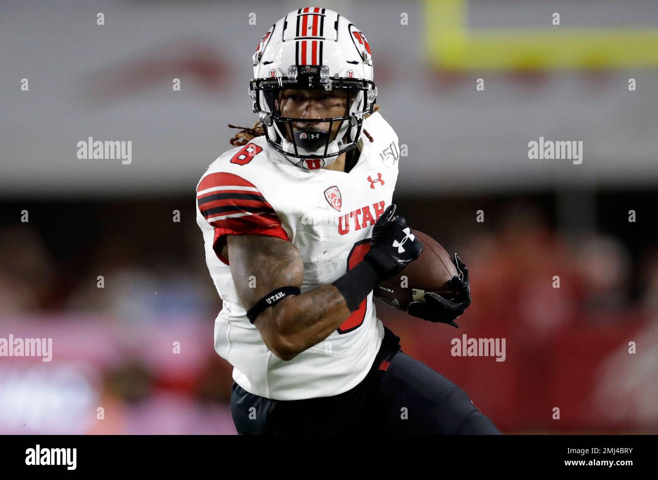 Utah wide receiver Derrick Vickers (8) runs against Southern California ...