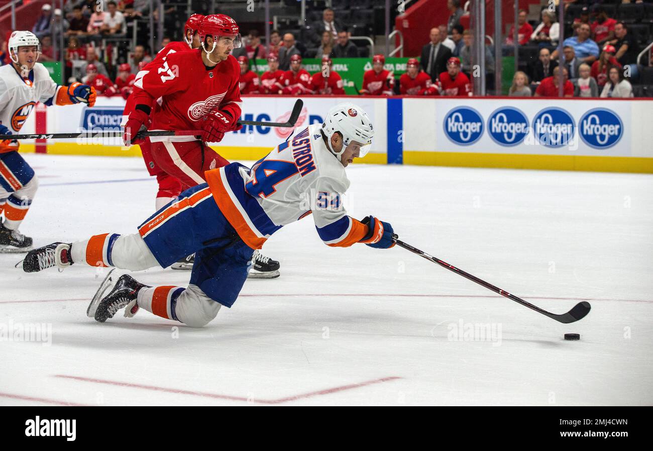 New York Islanders forward Oliver Wahlstrom (54) dives for the puck in ...