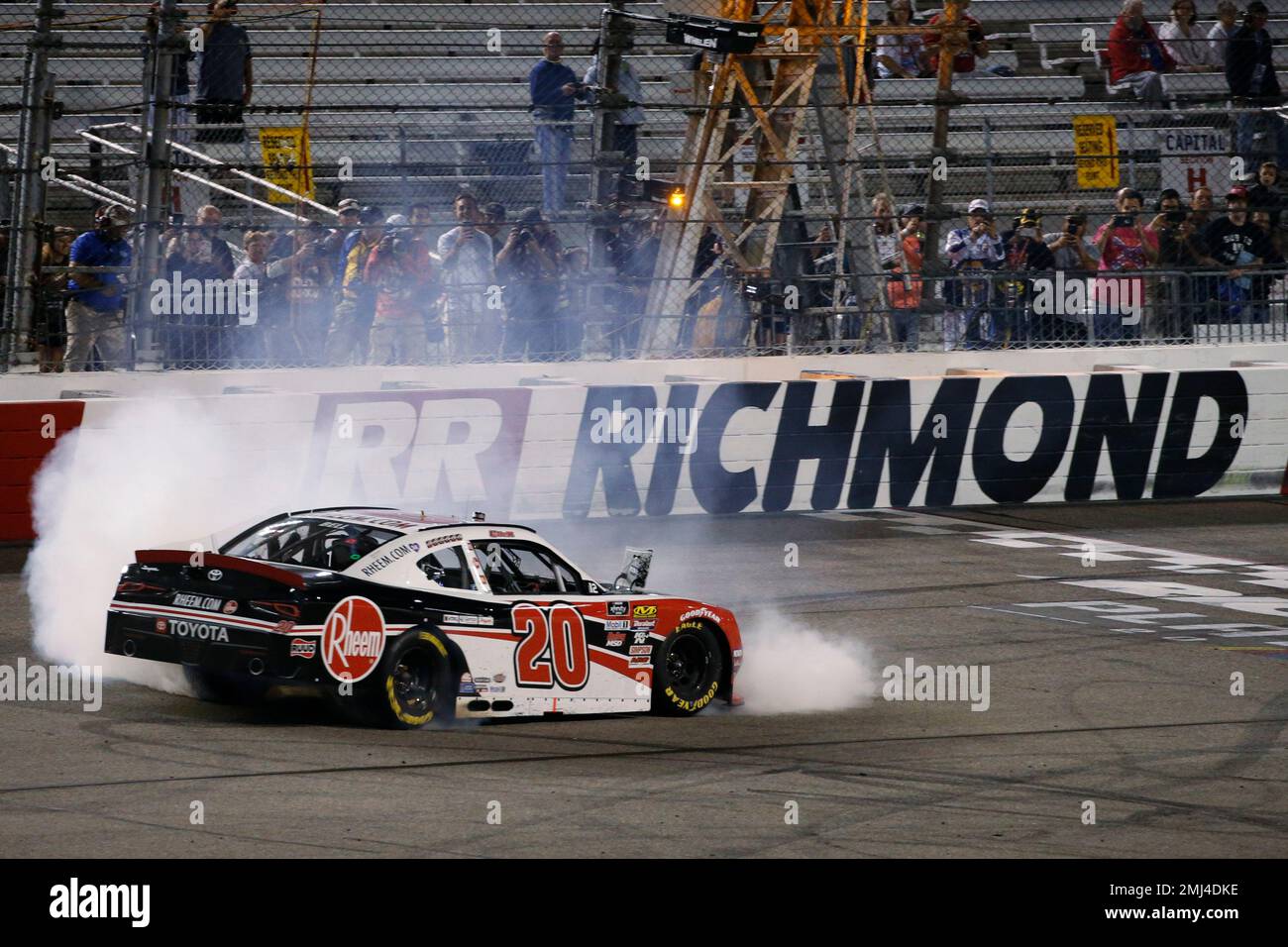 Christopher Bell does a burnout as he celebrates winning the NASCAR ...