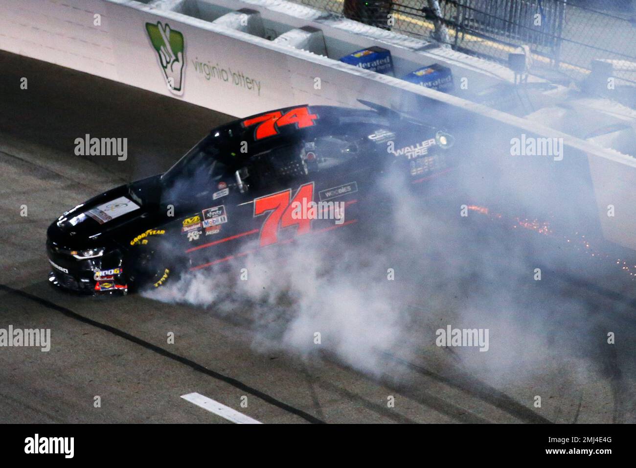 Tyler Matthews (74) hits the wall in Turn 2 during the NASCAR Xfinity ...