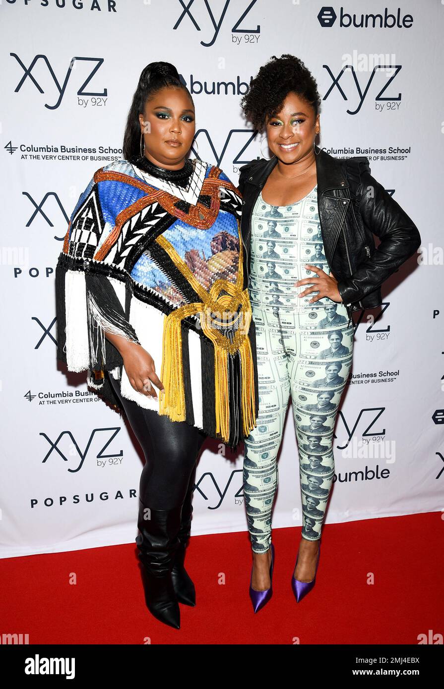 Singer Lizzo, left, and moderator Phoebe Robinson pose together ...