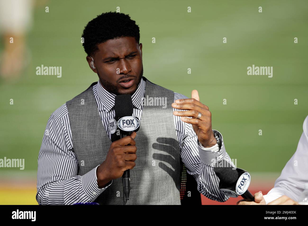 Former Southern California player Reggie Bush rehearses for a pregame ...