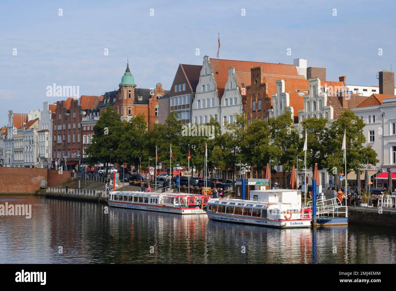 Buildings of the old town and ships on the Stadttrave, Luebeck, UNESCO ...