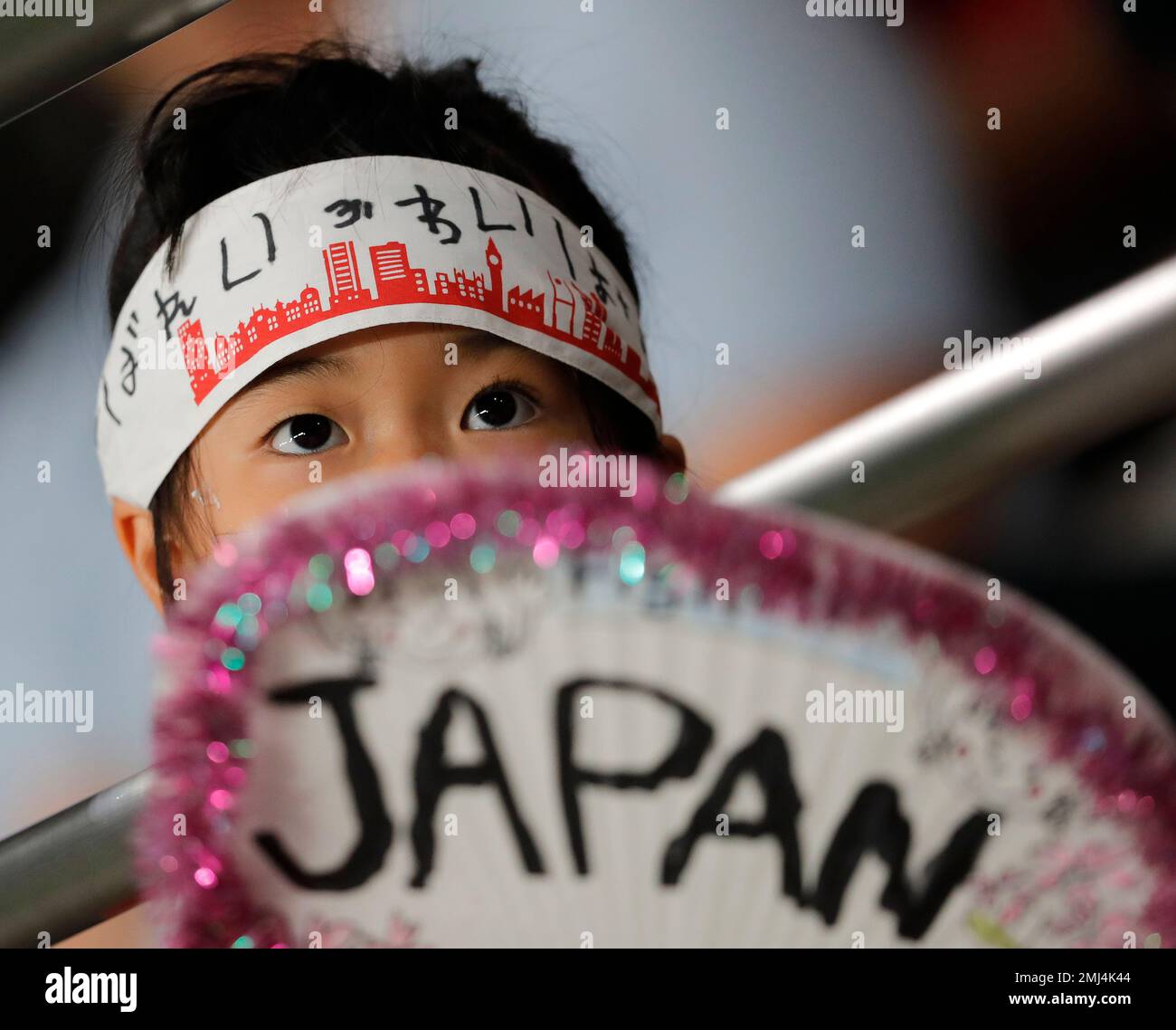 A young Japanese rugby fan waits for the start of the Rugby World Cup ...