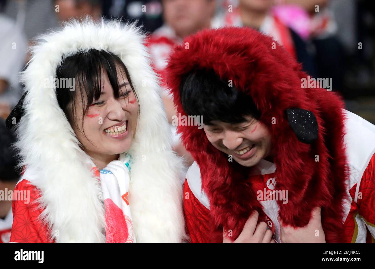 Japanese fans react as they wait for the opening ceremony at the Rugby ...