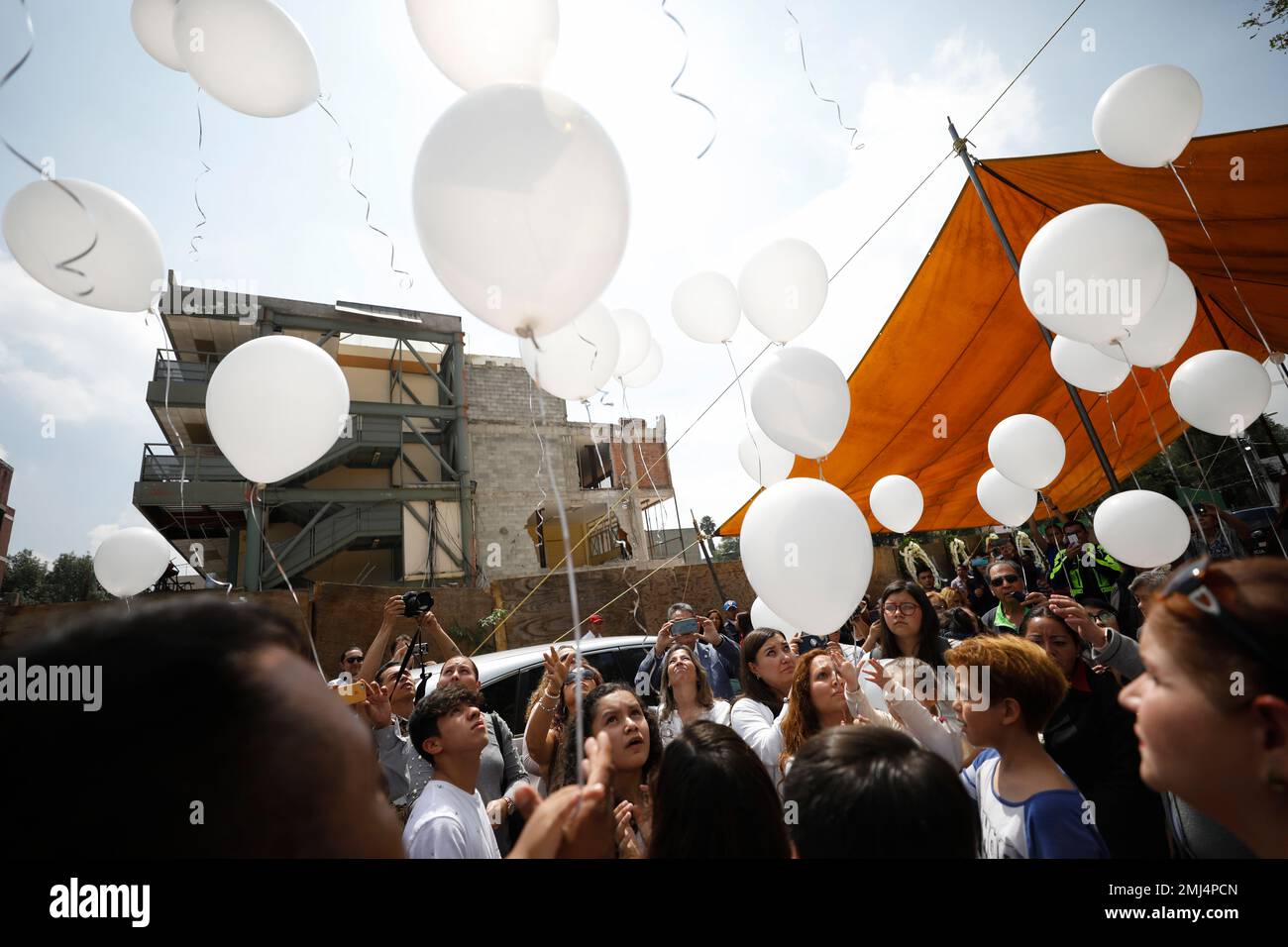 Parents and other relatives of the students and faculty who were killed ...