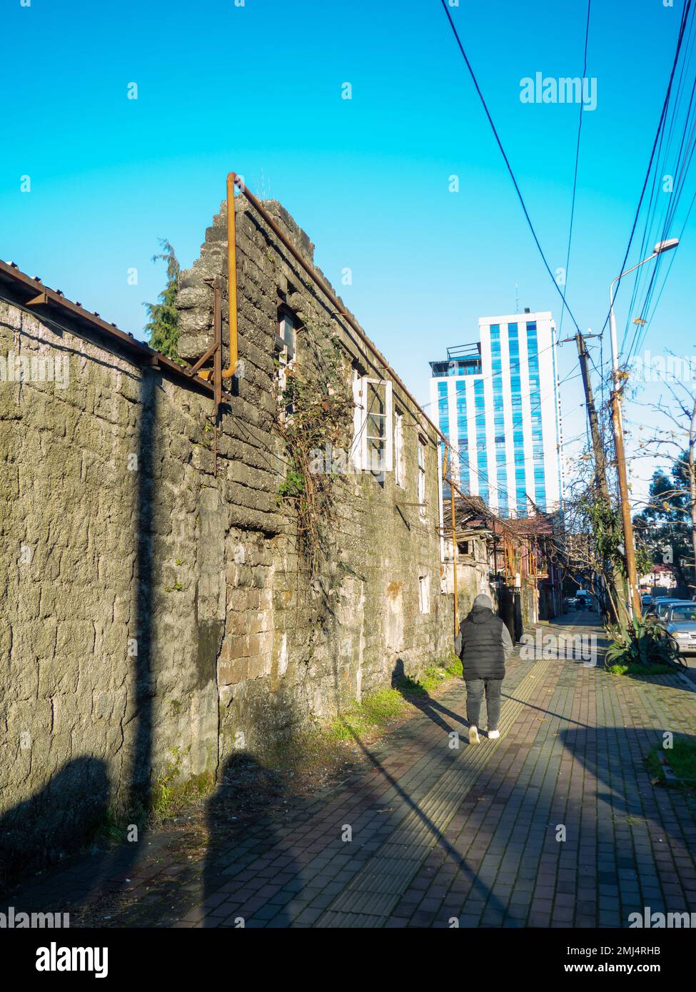 Window in a destroyed building. Remained a wall from the house. The ...
