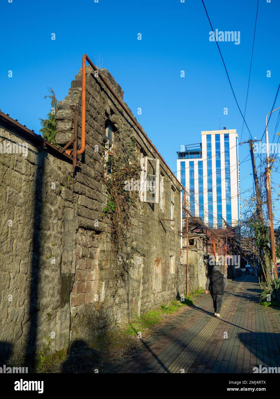 Window in a destroyed building. Remained a wall from the house. The ...