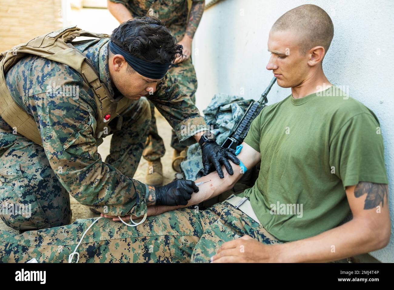 U.S. Navy Hospital Corpsman 3rd Class Dylan Sillero, left, with 1st ...