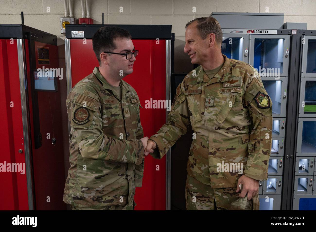 Maj. Gen. Corey Martin, 18th Air Force commander, coins Staff Sgt ...