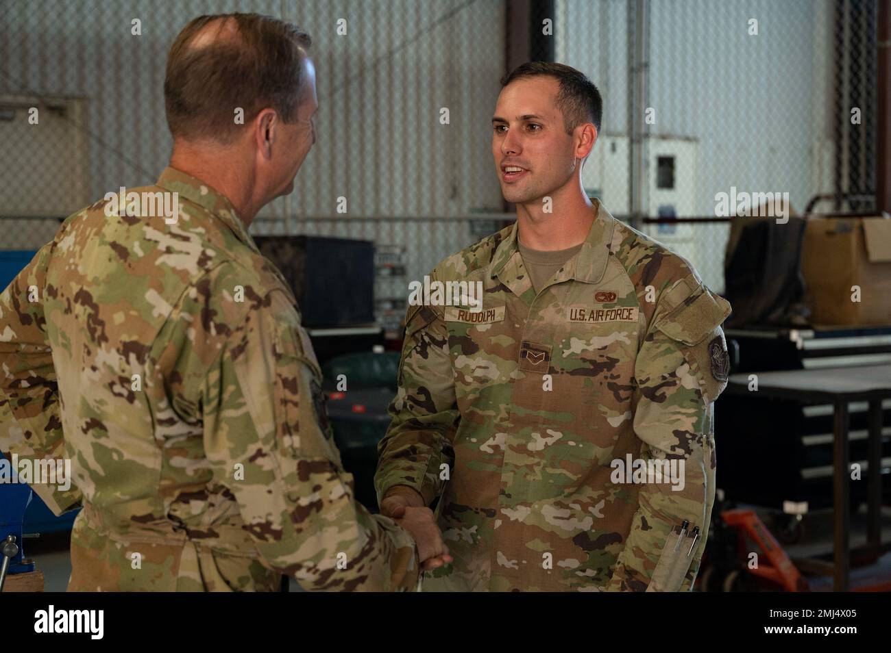 Maj. Gen. Corey Martin, 18th Air Force commander, coins Senior Airman ...