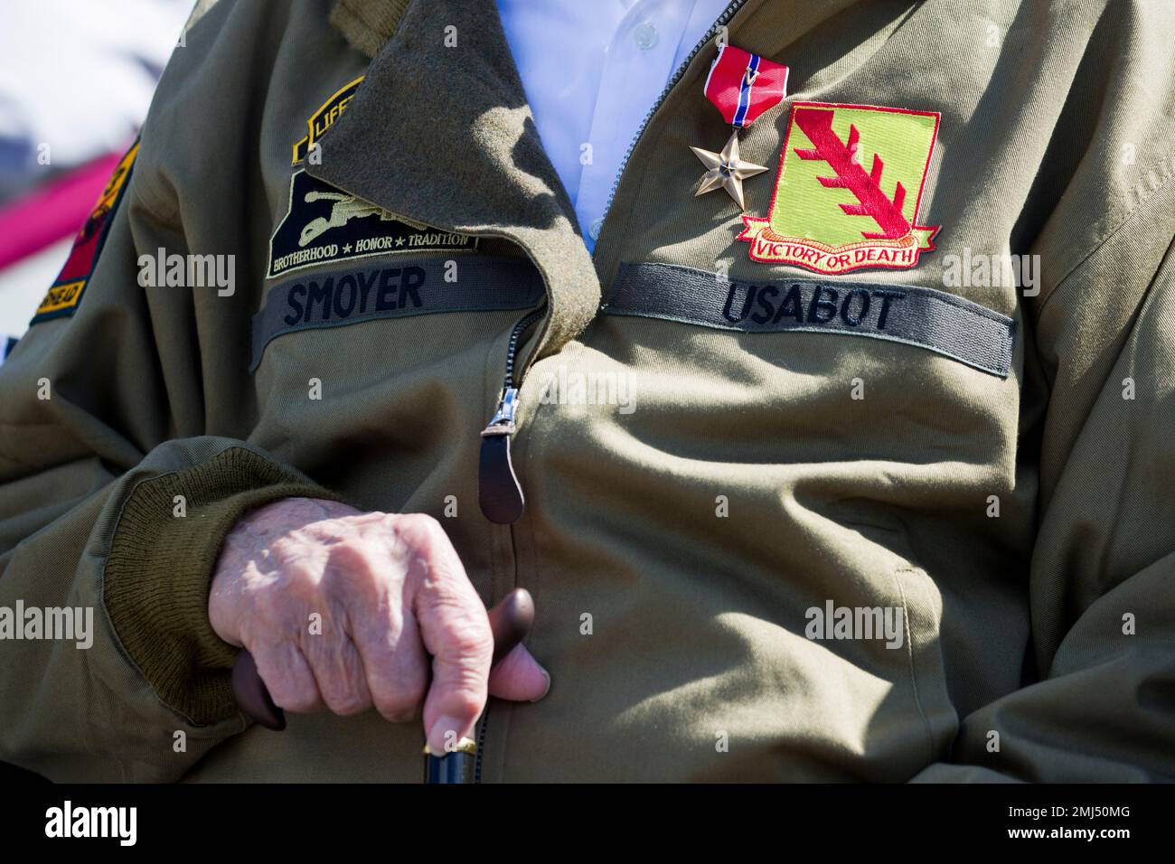 World War II veteran Clarence Smoyer, 96, sits after receiving the ...