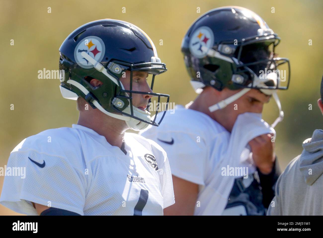 Pittsburgh Steelers backup quarterback Devlin Hodges, left, walks with ...