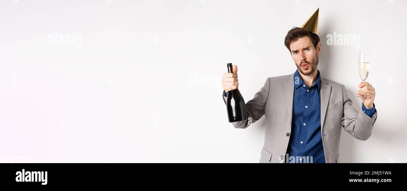 Celebration and holidays concept. Happy man in suit having fun at party ...
