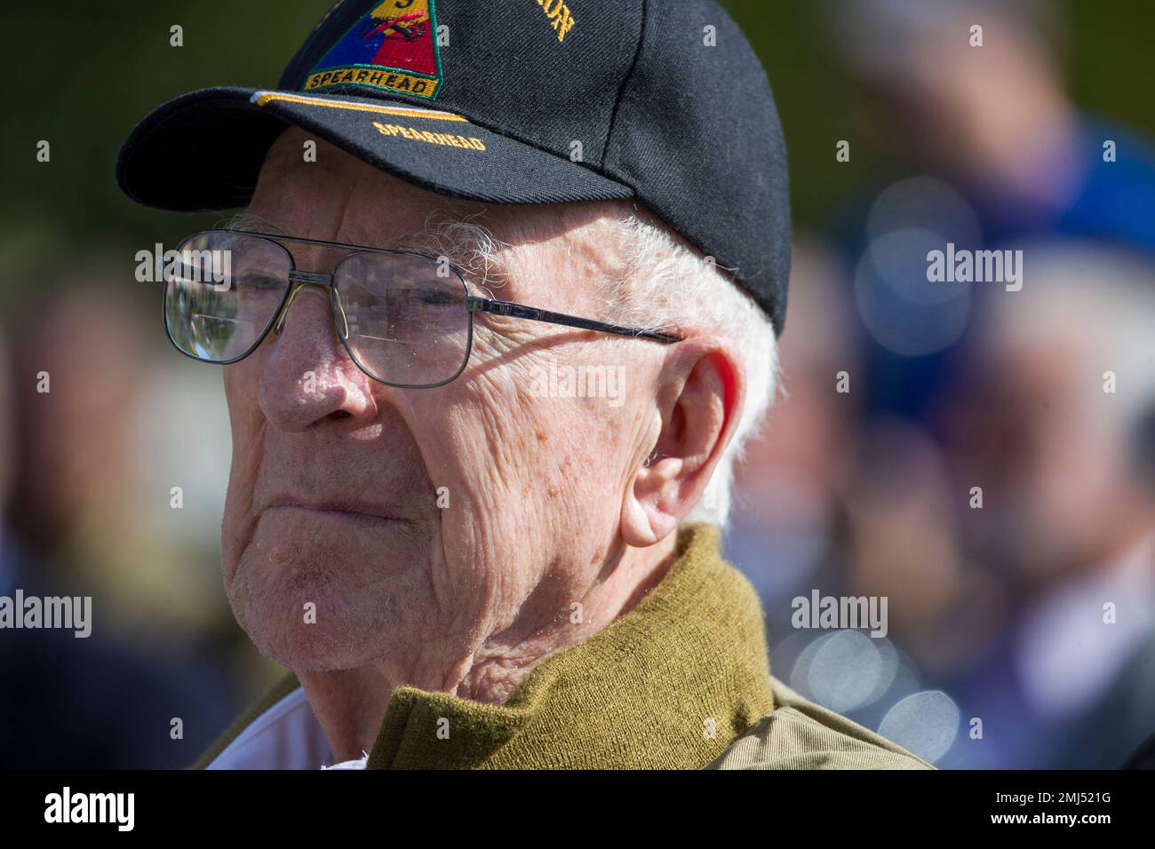 World War II veteran Clarence Smoyer, 96, sits before receiving the ...