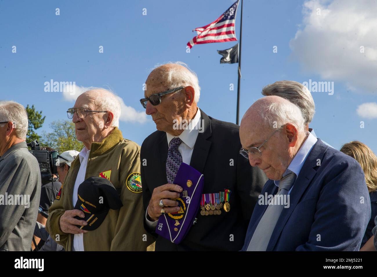 World War II veterans Clarence Smoyer, 96, left, Joseph Caserta and ...