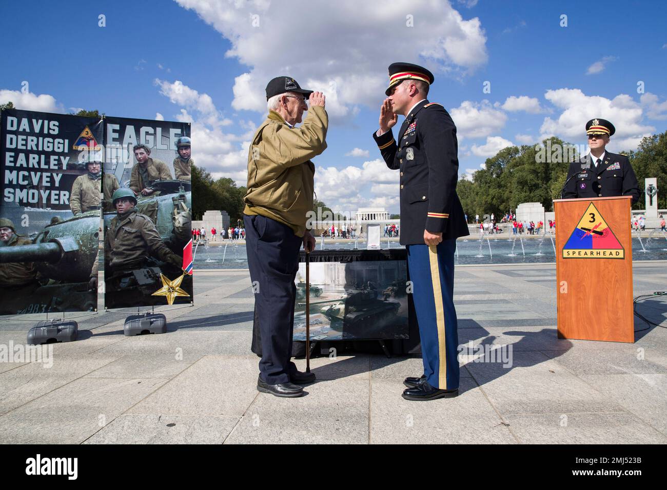 World War II veteran Clarence Smoyer, 96, salutes after receiving the ...