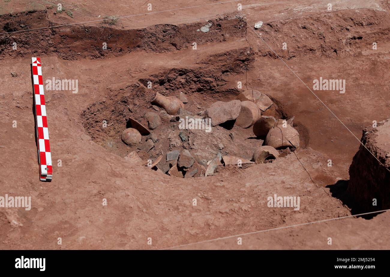 Pre-Hispanic vessels are partially covered at the Kalasasaya temple in ...