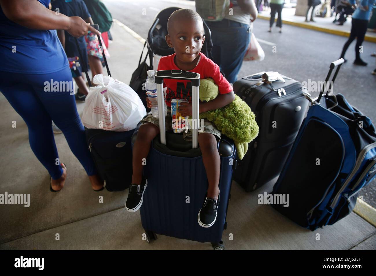 3-year-old Hurricane Dorian evacuee Trevanti Saunders of Freeport, sits ...