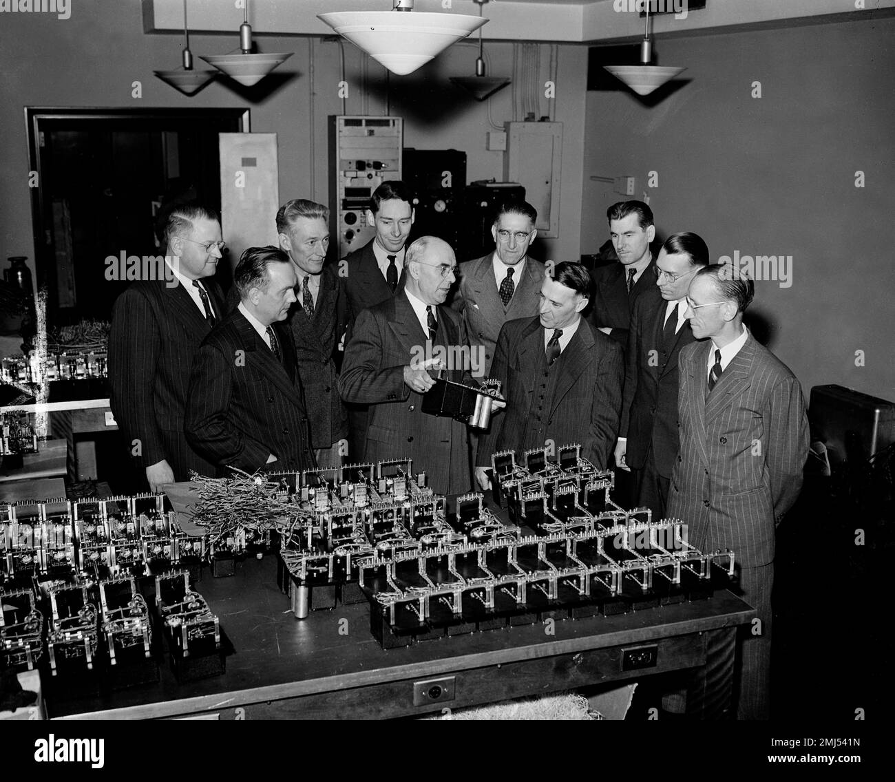 The engineering and WirePhoto staff of The Associated Press display ...