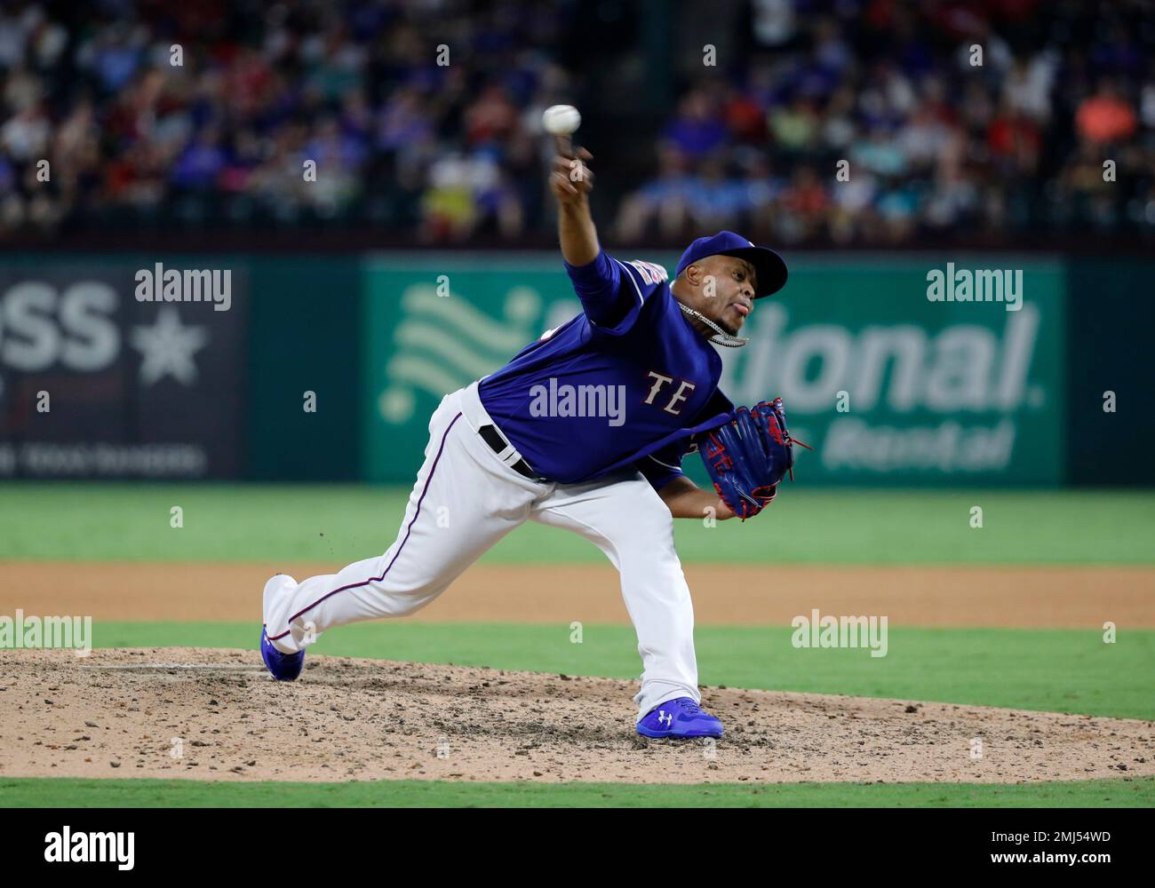 Texas Rangers starting pitcher Edinson Volquez works against the ...