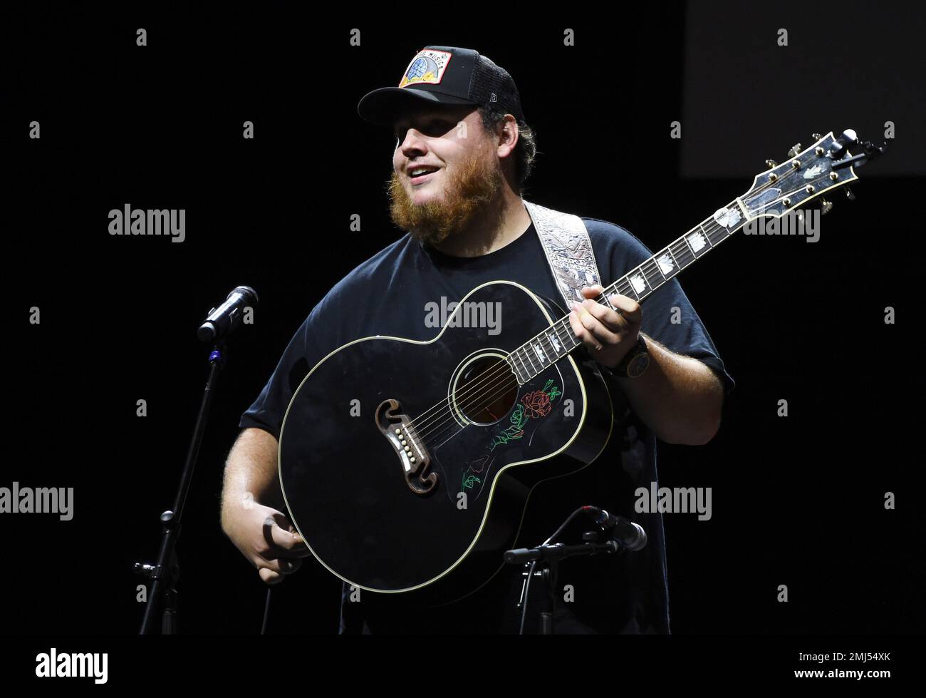 Country singer Luke Combs takes the stage at the All for the Hall ...