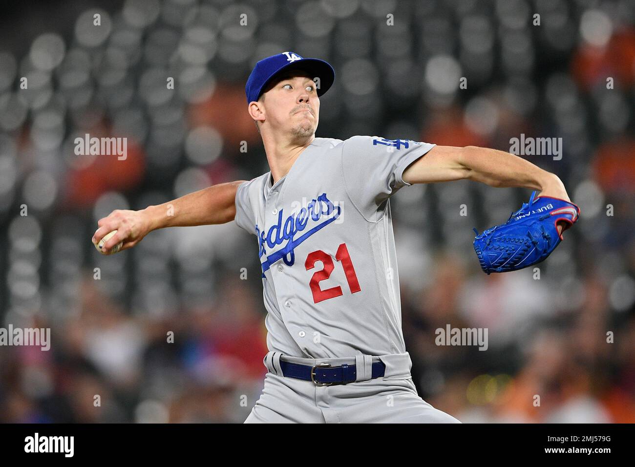 Los Angeles Dodgers starting pitcher Walker Buehler delivers a pitch ...