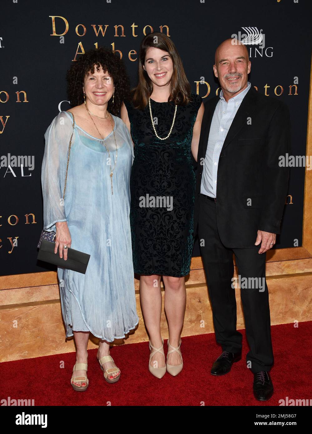 Susie Essman, left, and husband Jim Harder pose with their daughter at ...
