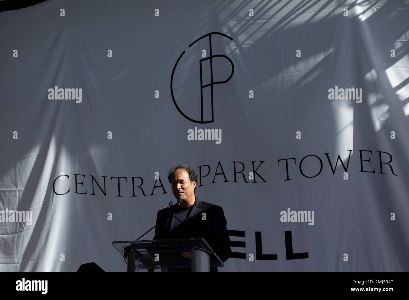 Gary Barnett, owner and founder of Extell, speaks at the topping out ...