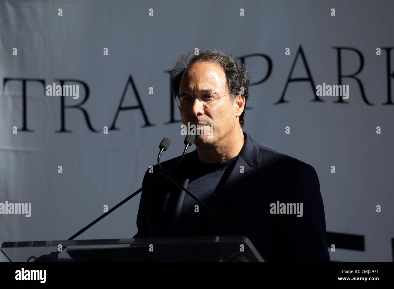 Gary Barnett, owner and founder of Extell, speaks at the topping out ...