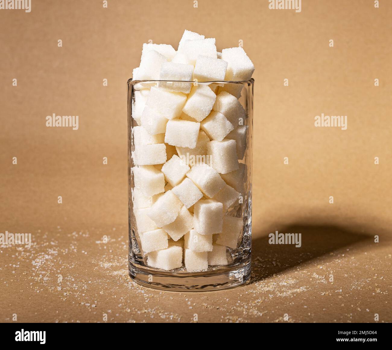 Sugar consumption, addiction concept. Refined cubes, sweet lumps in ...